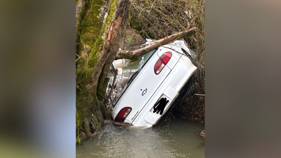 Person rescued from car with ‘water rising up to their neck’