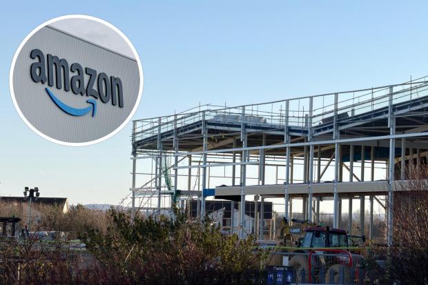 Pictures show progress at Amazon's giant new warehouse beside major road