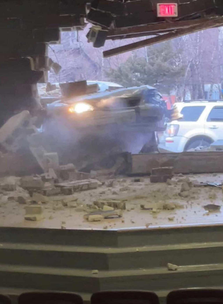 Video shows car barreling through NJ high school auditorium with ...