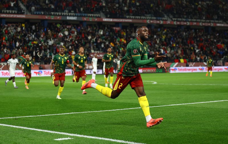 Soccer-Cameroon again overcoming adversity to flourish at major tournament