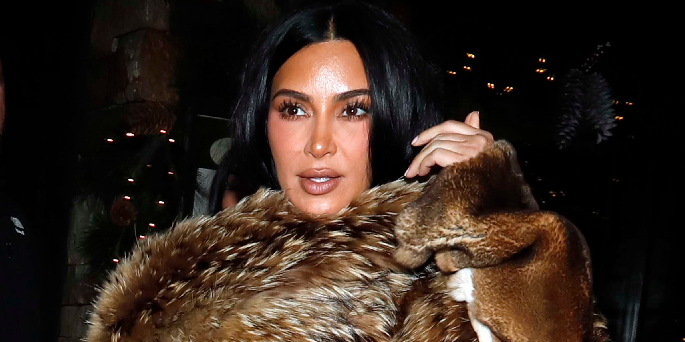 Kim Kardashian's first look of 2026? A fur coat layered over a fur corset