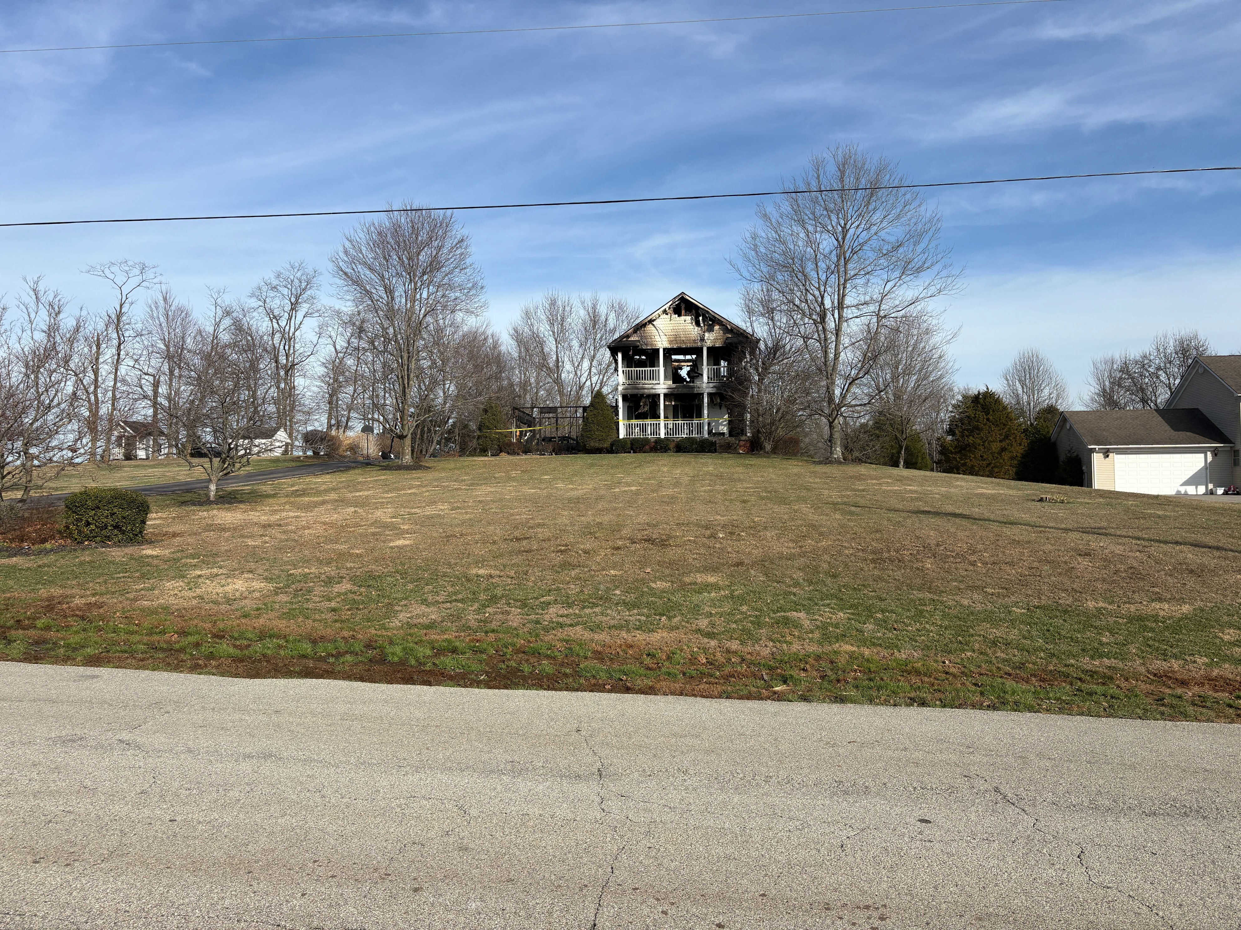 Man dies in Clark County house fire after running in to rescue family dog