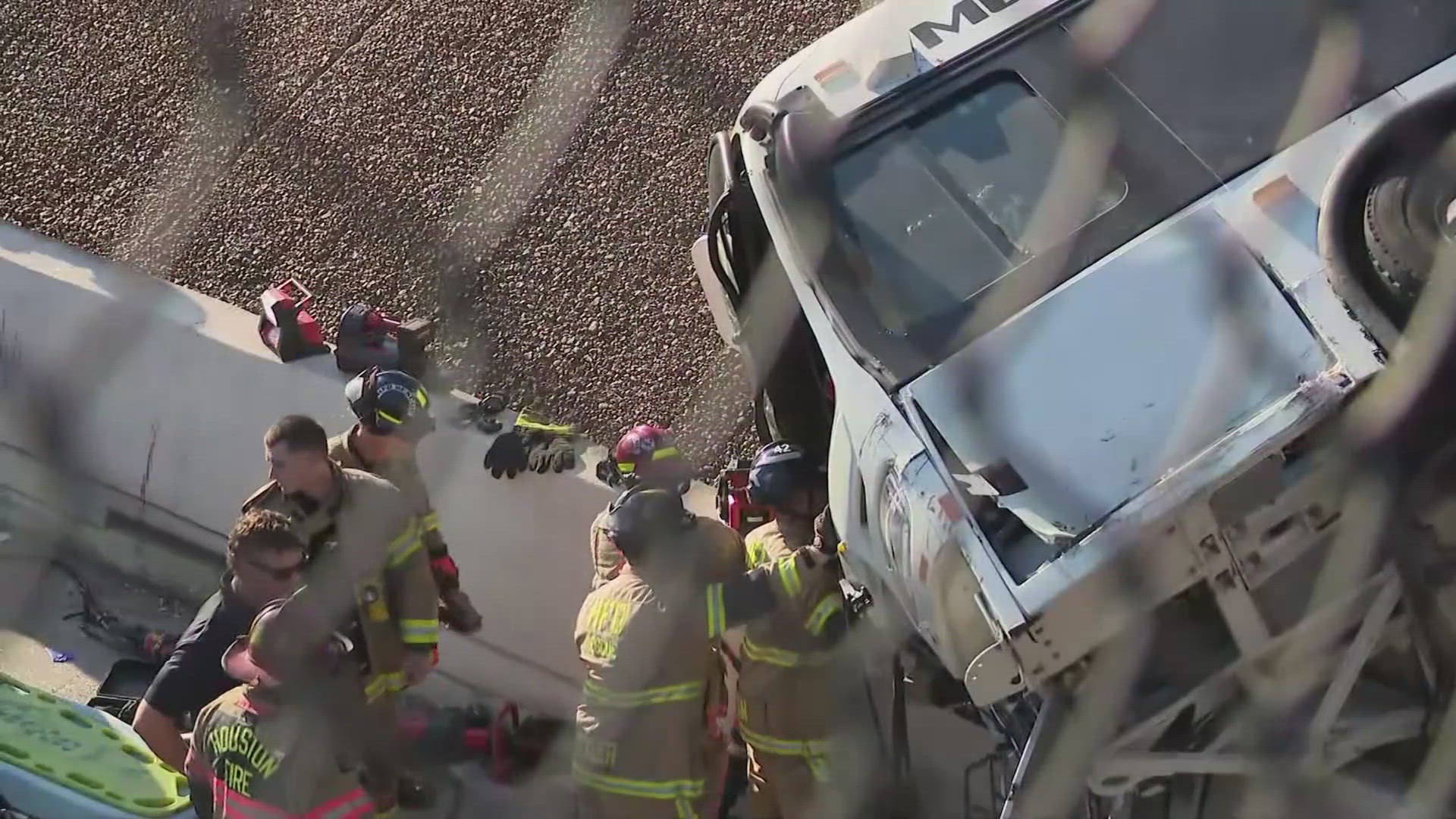 Bus falls off overpass in Houston, TX