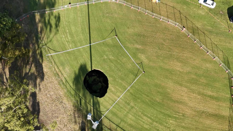 'Stay away': Sinkhole opens up in footy field