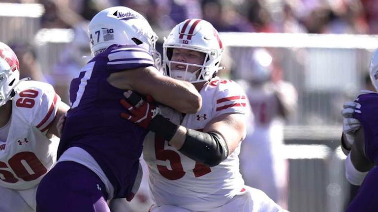 Illinois signs Wisconsin transfer center Jake Renfro to stabilize ...