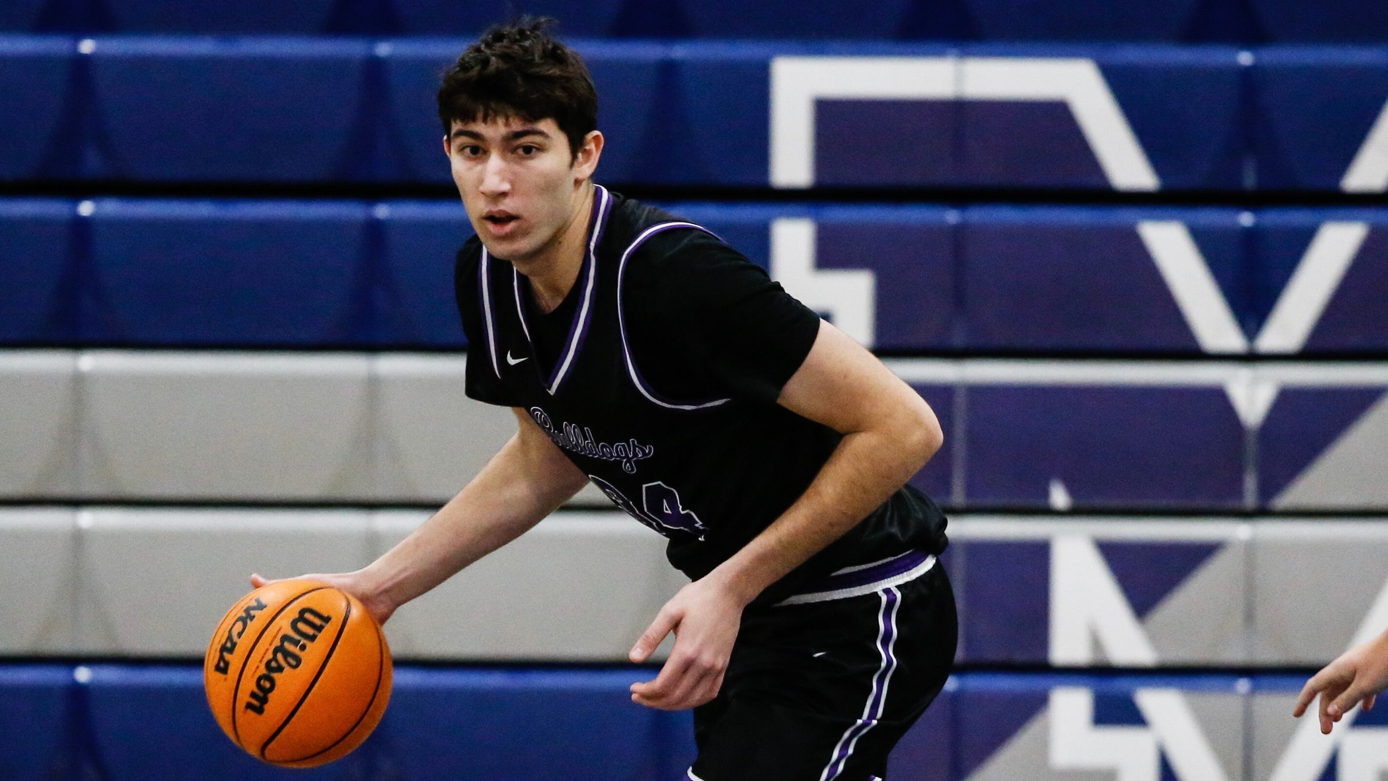 Coach faces former team in basketball rivalry that had fans standing ...