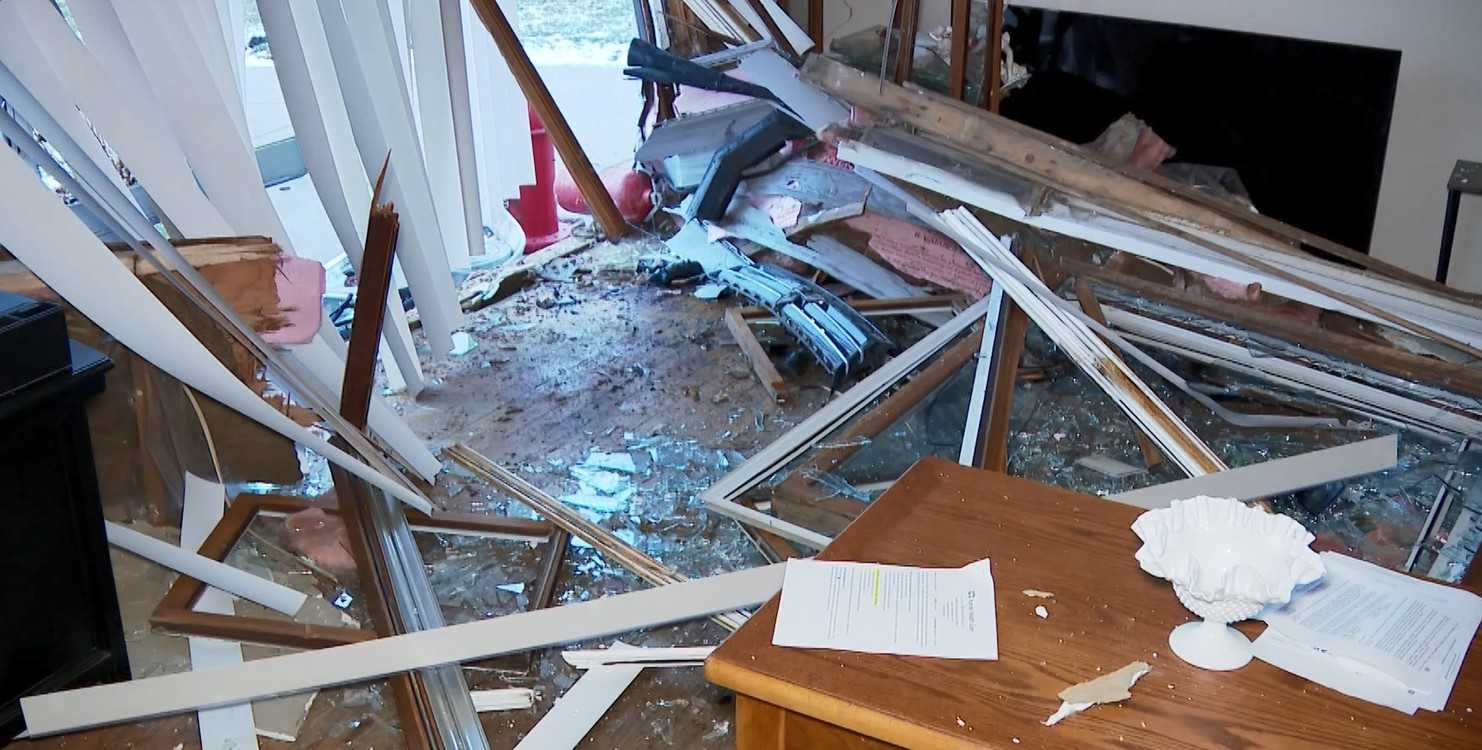 A car crashes into a Caledonia home, with the owner inside