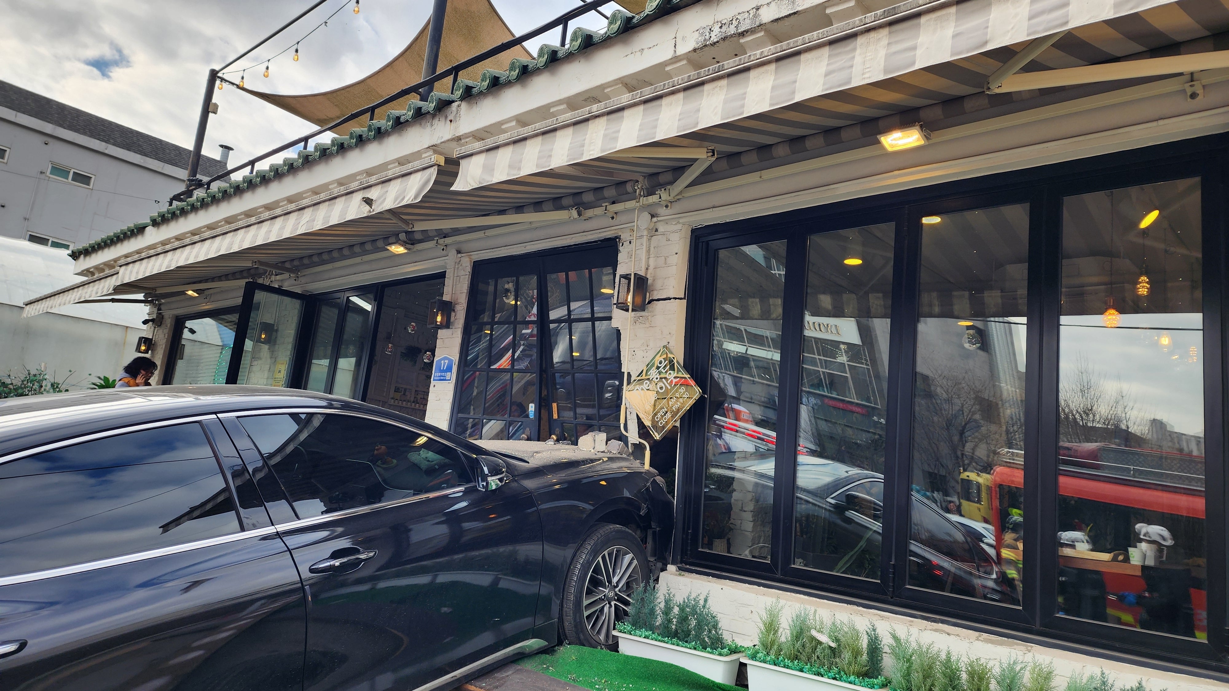 60s woman's car veers into cafe after accelerator mistake