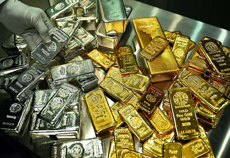 Gold, silver prices surge to 1-week high as geopolitical tensions ...