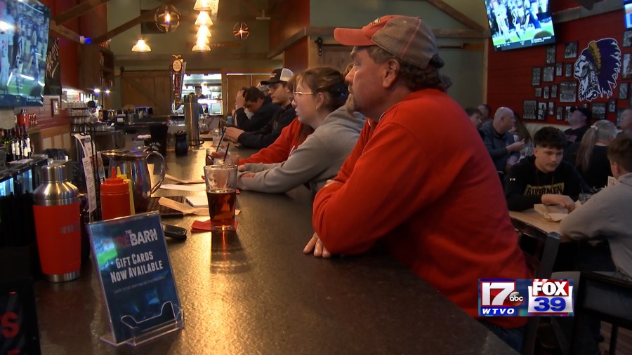 Football fans gather in Durand for watch party to cheer on Jake ...