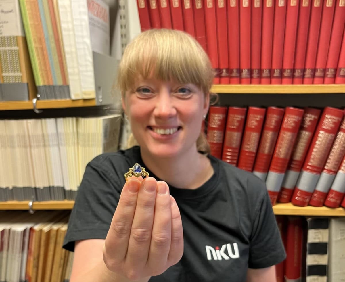 Archaeologist unearths intricate medieval gold ring in historic Viking town