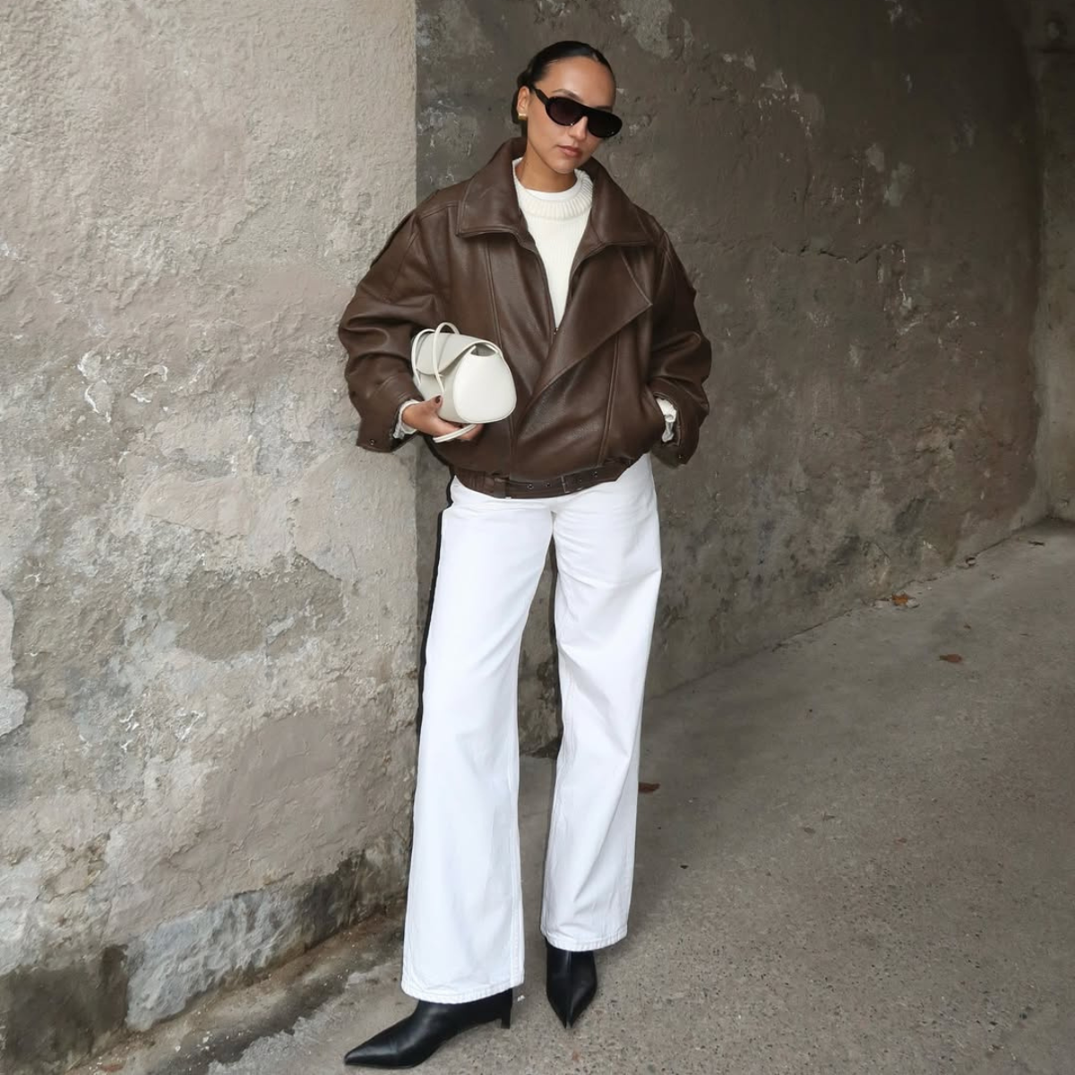 Jeans and ankle boots are nothing new, but no one styles them quite ...