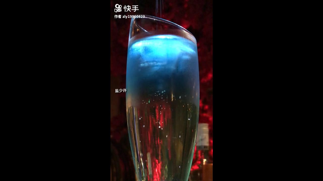 Crafting a blue sparkle champagne cocktail