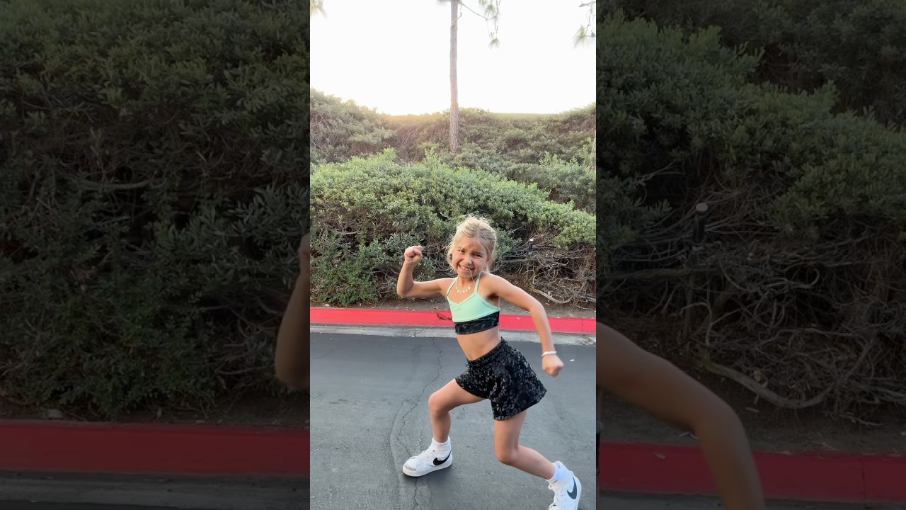 Young girl performs the high-energy Pop Muzik dance trend