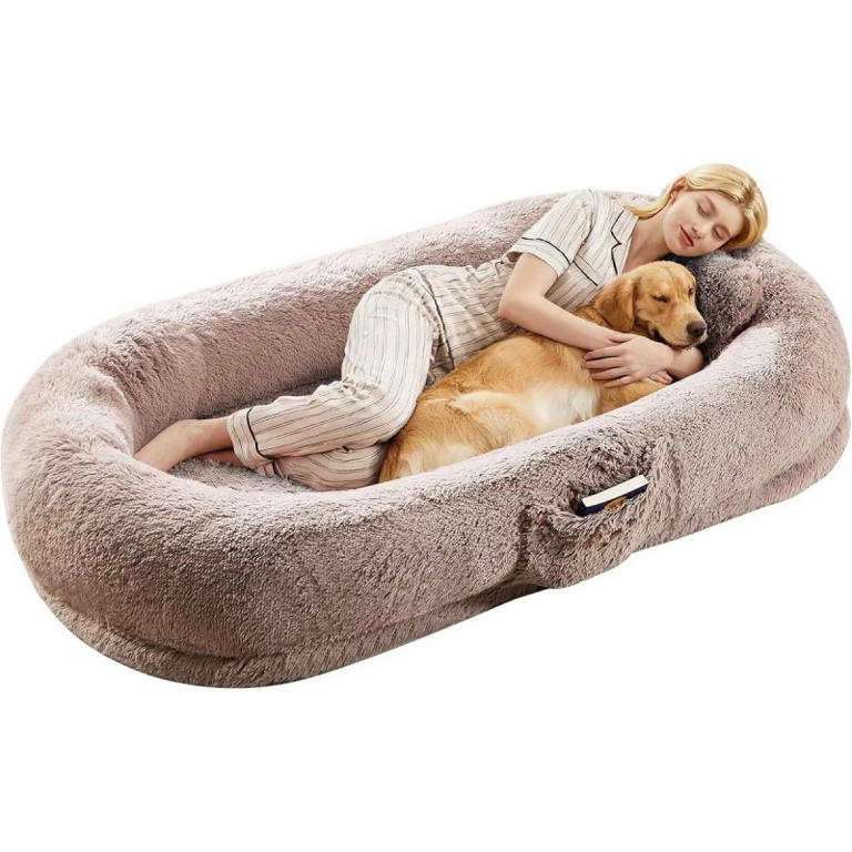 This human-sized dog bed is perfect for cuddling your furry friend
