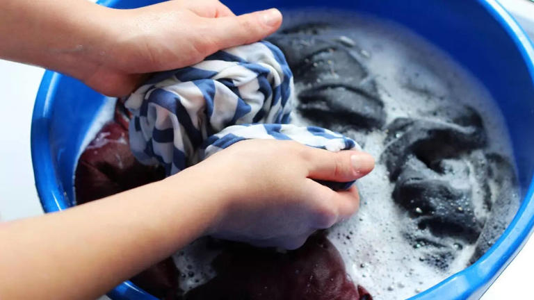 Should you wash clothes and towels together, or is that quietly ruining ...
