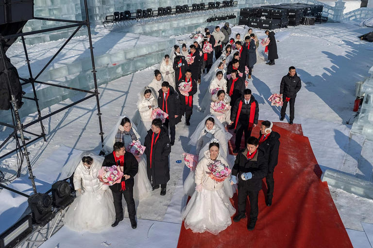 Love in the cold: Mass wedding at Harbin Ice and Snow Festival