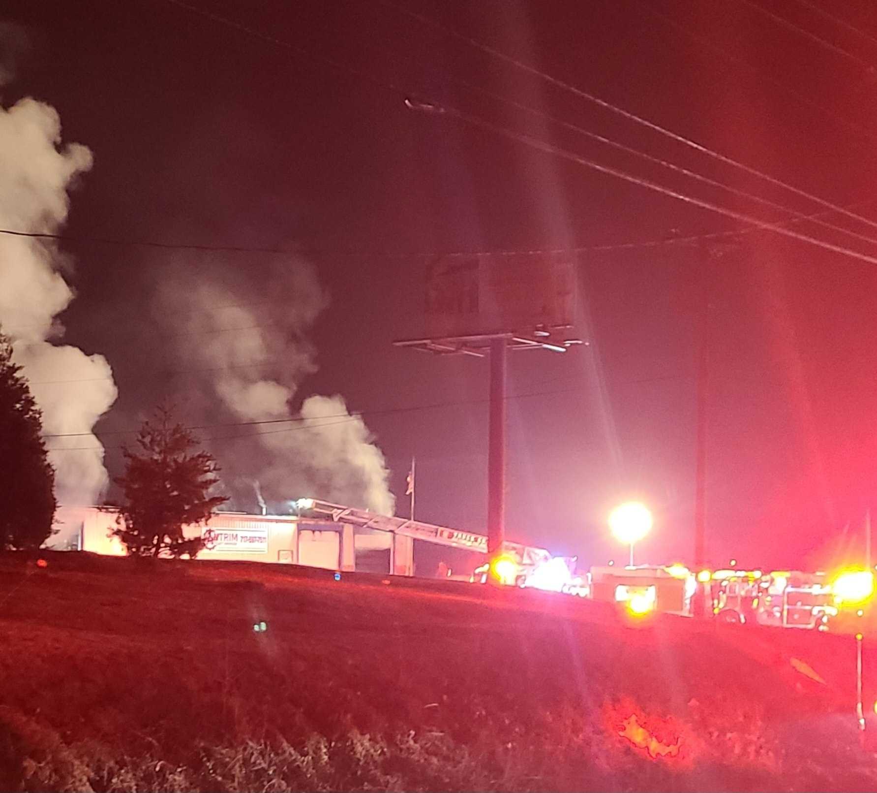 Crews battle early morning fire at truck repair shop