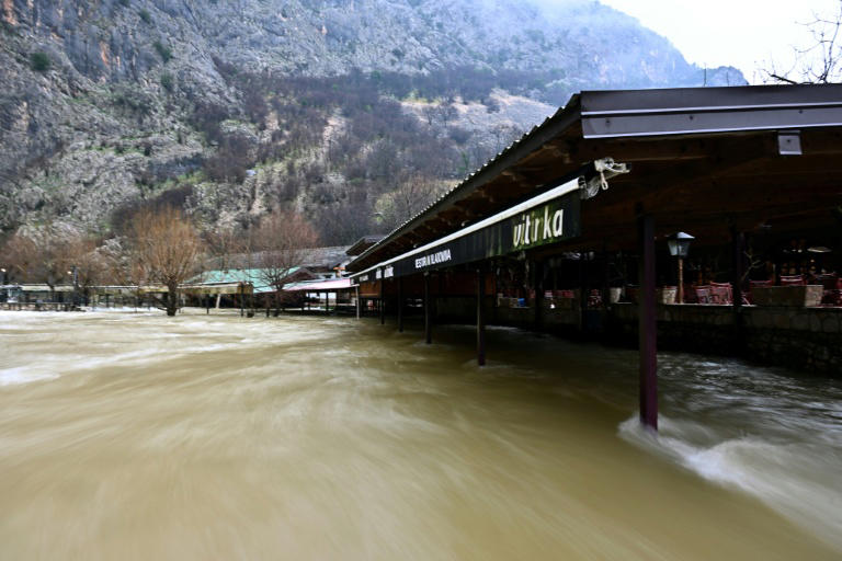 One dead as snow and rain cause floods, power cuts in Balkans