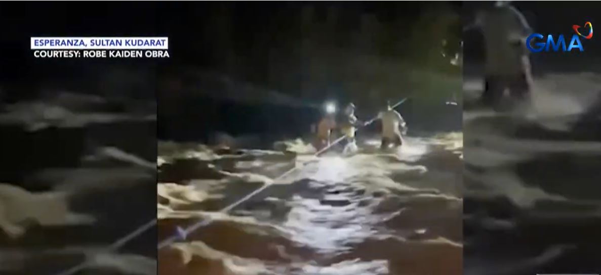 Teachers brave raging river in Sultan Kudarat to reach school