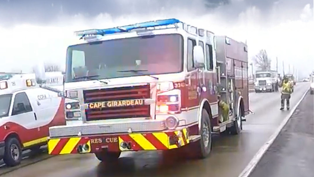 Semi and SUV collision on a slippery road