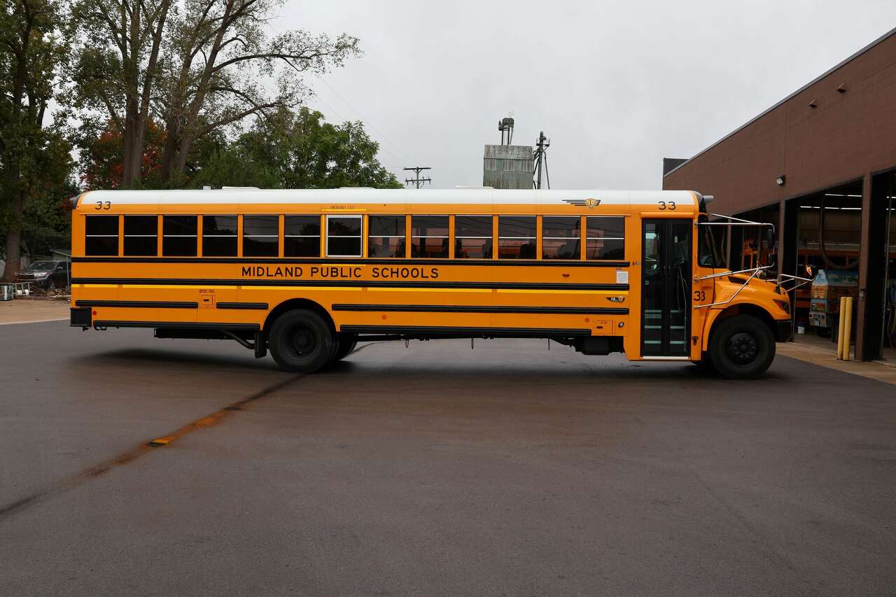 Midland Public Schools, police investigating after bus strikes tree