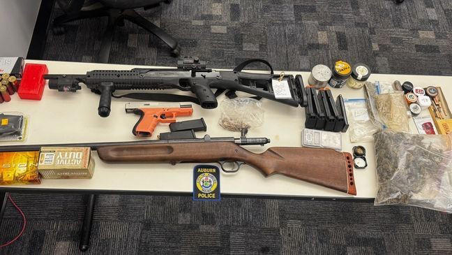 Woman arrested after police find drugs, guns during bail check in Auburn
