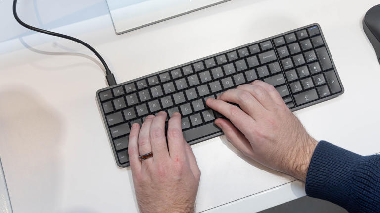 I spent a week with HP's EliteBoard G1a, a desktop PC stuffed into a ...