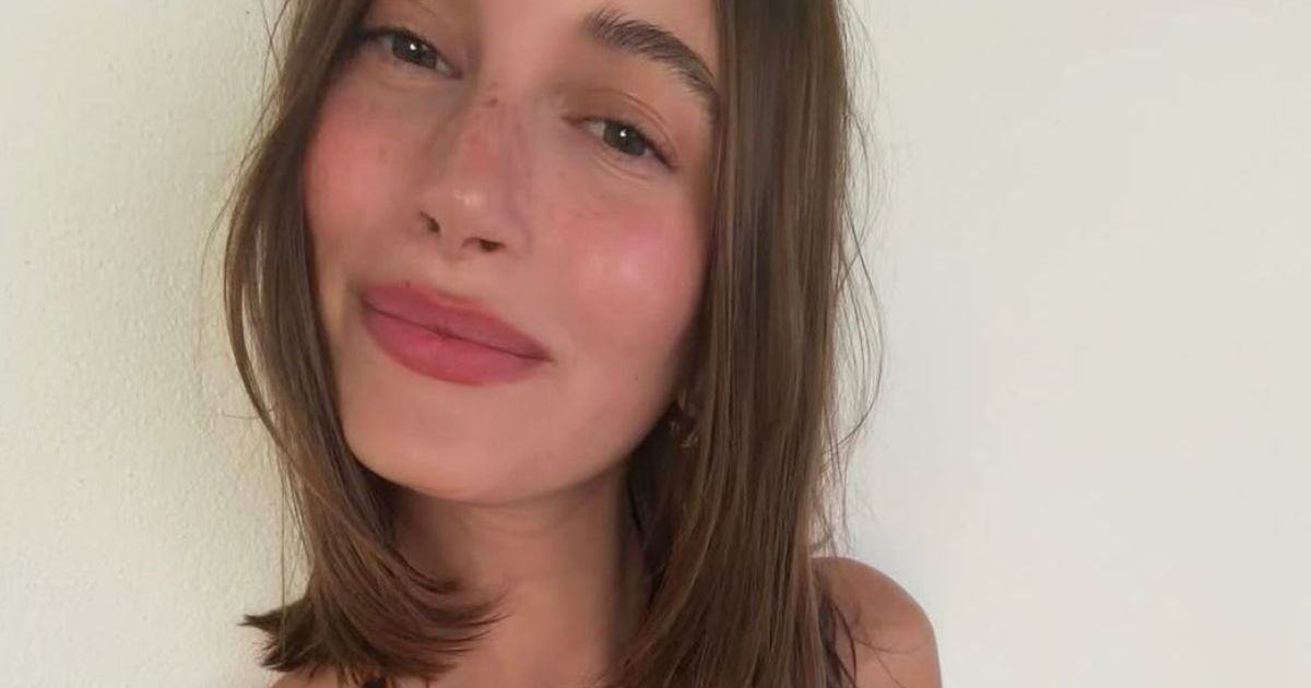 Hailey Bieber flaunts toned abs in Roberto Cavalli laced-up swimsuit