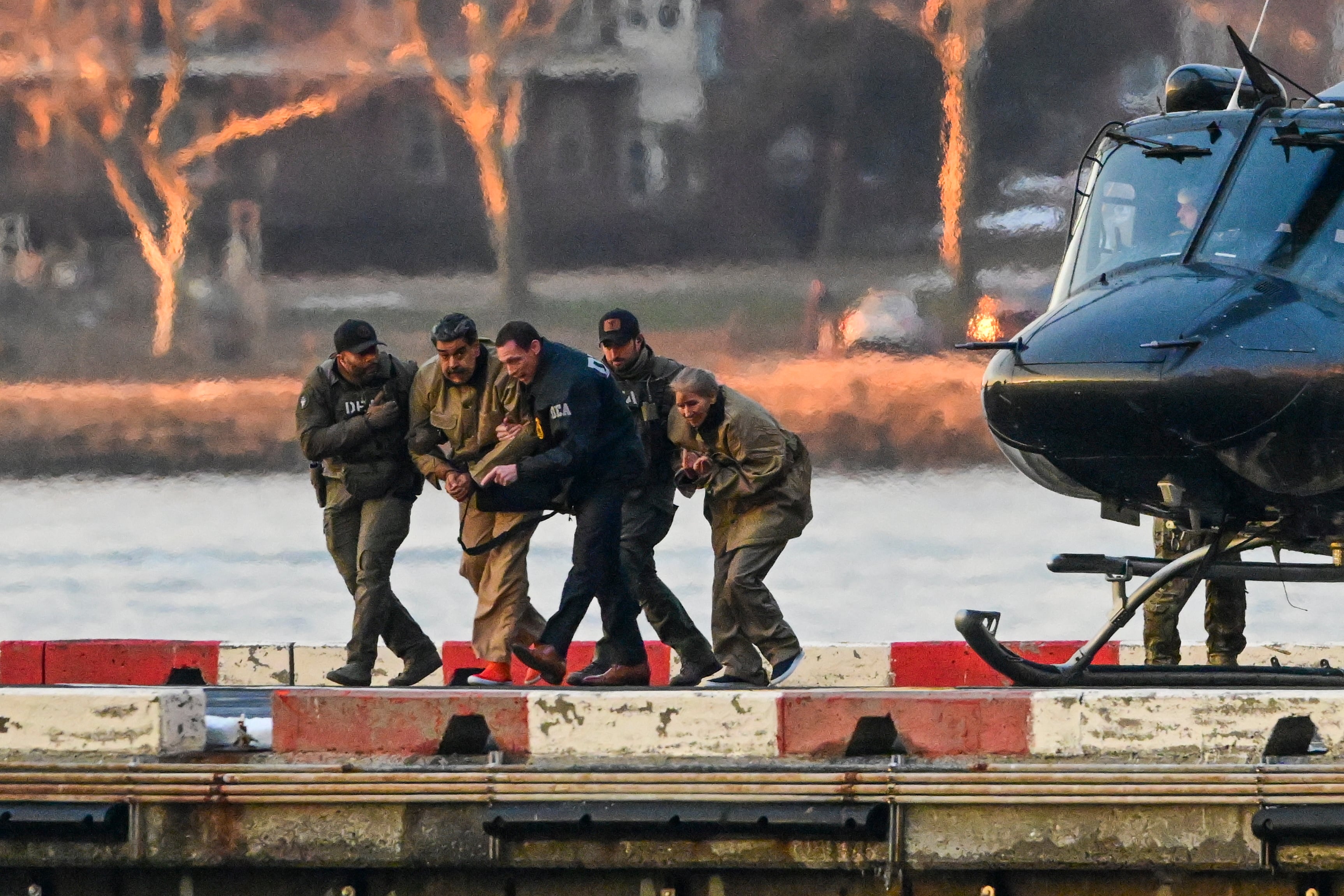 Shackled Maduro asserts kidnapping in US trial