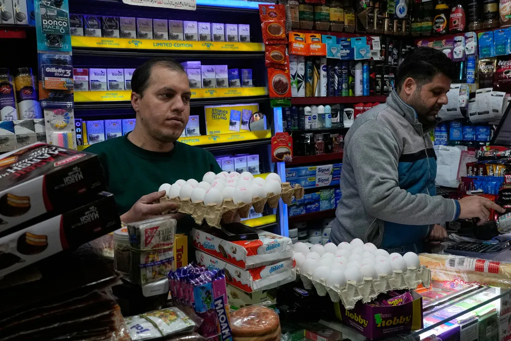 Iran rolls out $7 payments to quell affordability protests