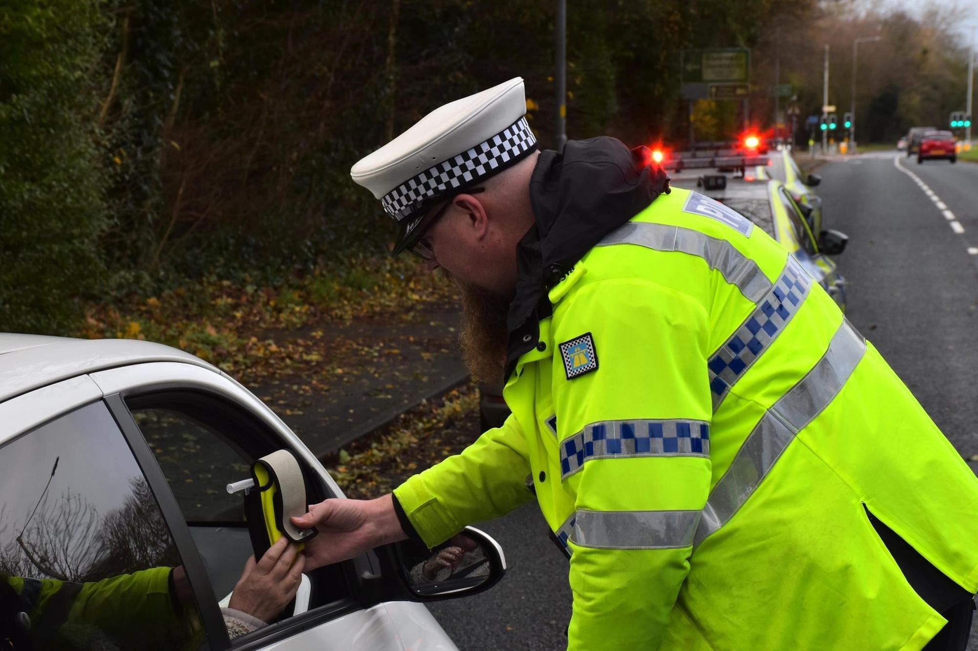 Unlicensed Sunderland driver crashes onto roundabout after spotting police