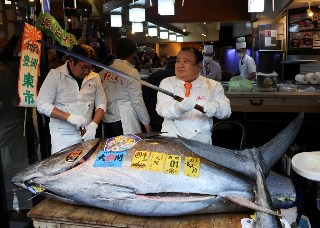Giant tuna the size of a motorcycle sold to 'Tuna King' for record $3.2 ...