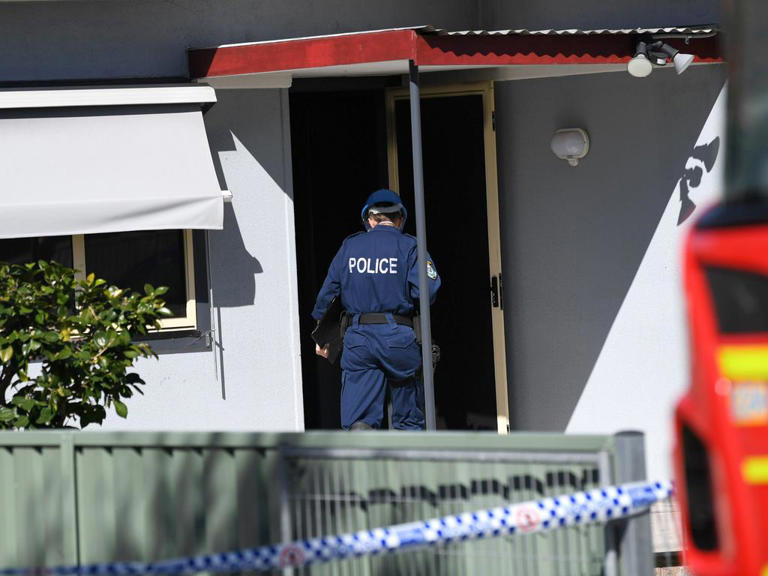 Carer charged years after fatal house fire