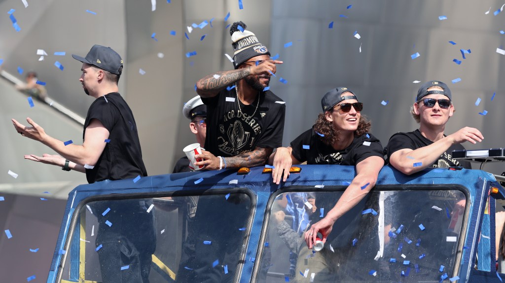 A member of the Dodgers' championship roster was cut by his new team