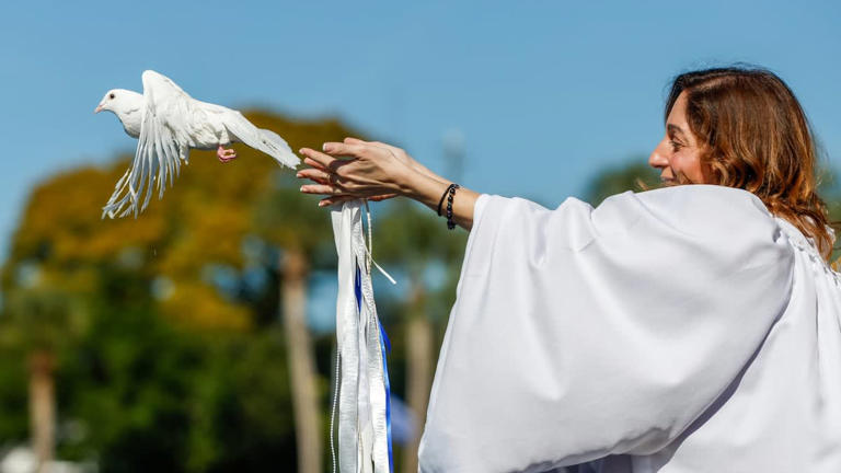 Tarpon teen retrieves cross in 120th Epiphany celebration