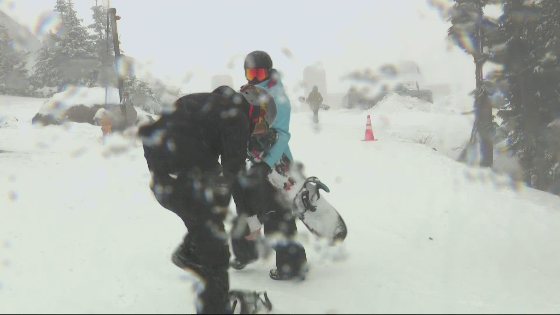 Skiers cheer arrival of first major Cascades snowstorm