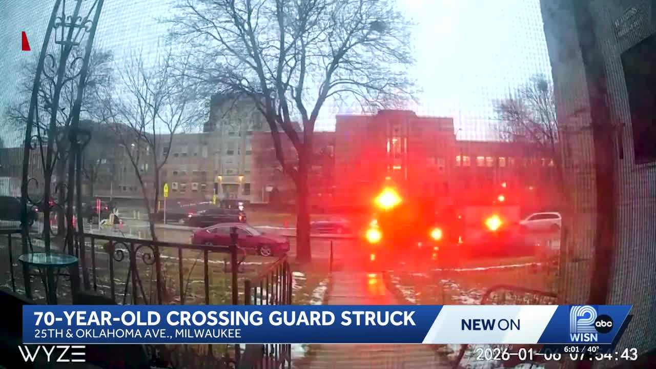 Car hits school crossing guard during morning drop-off