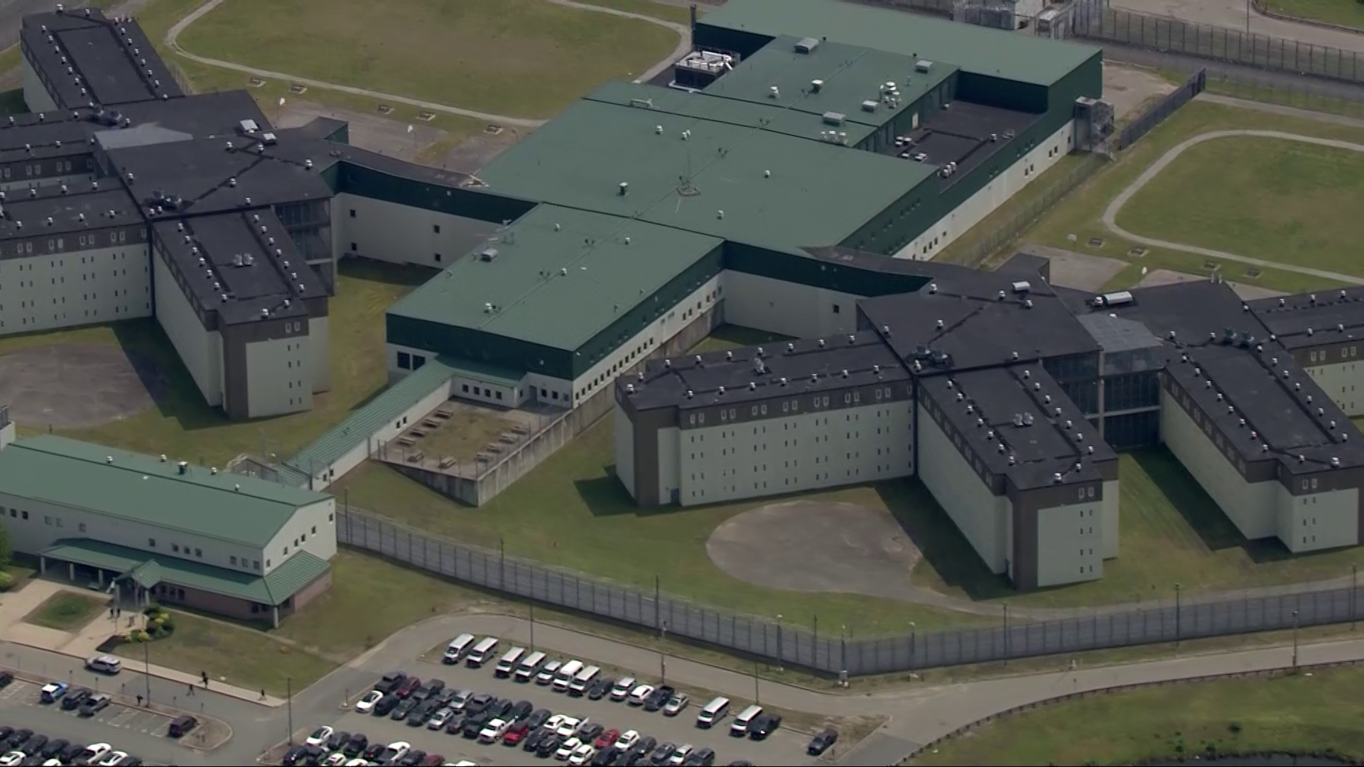 Two Mass. corrections officers accused of beating restrained inmate