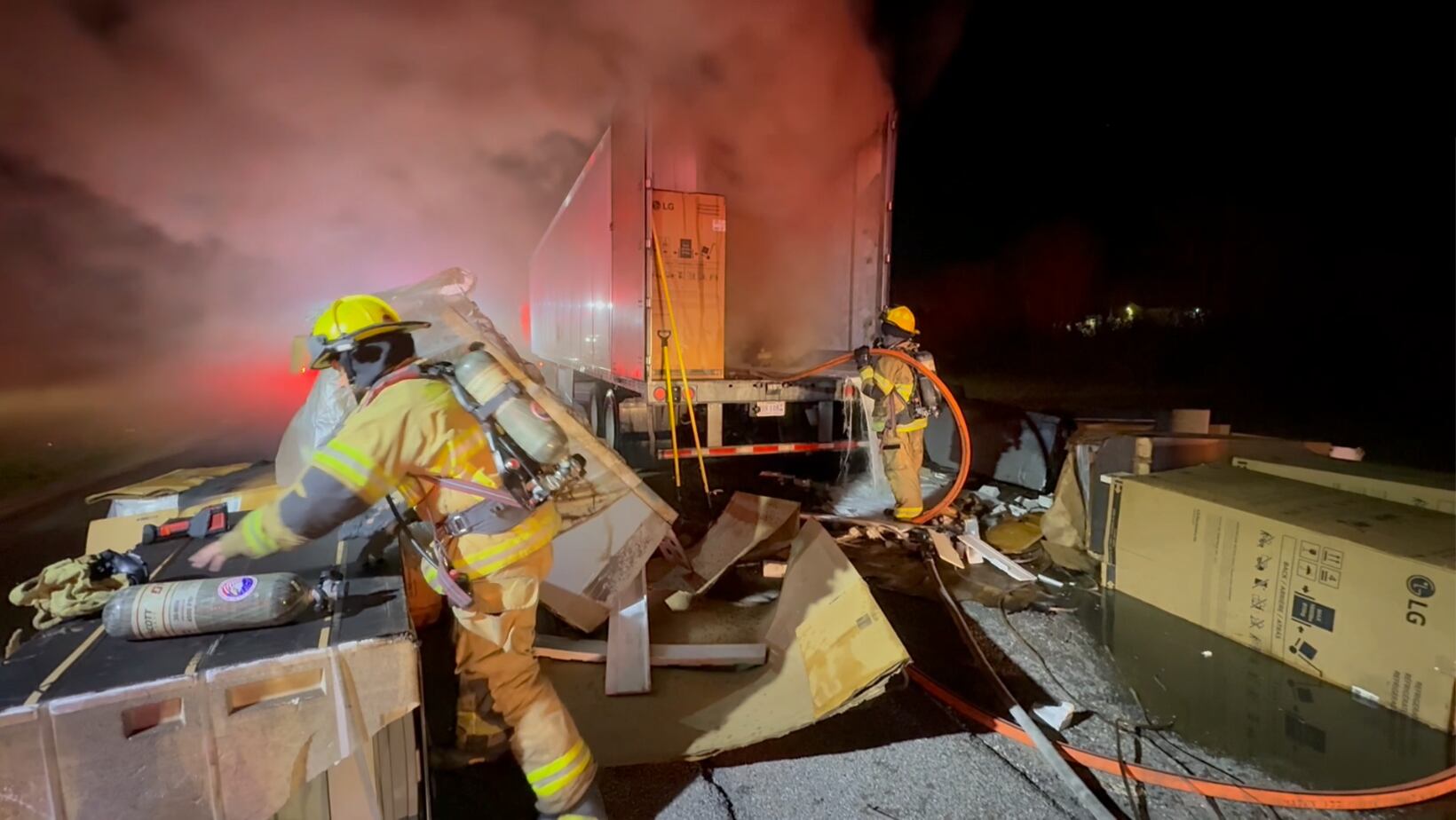 Firefighters respond after trailer loaded with refrigerators catches ...