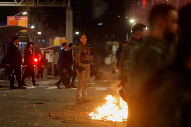 Teen killed after bus hits ultra-Orthodox protesters in Jerusalem