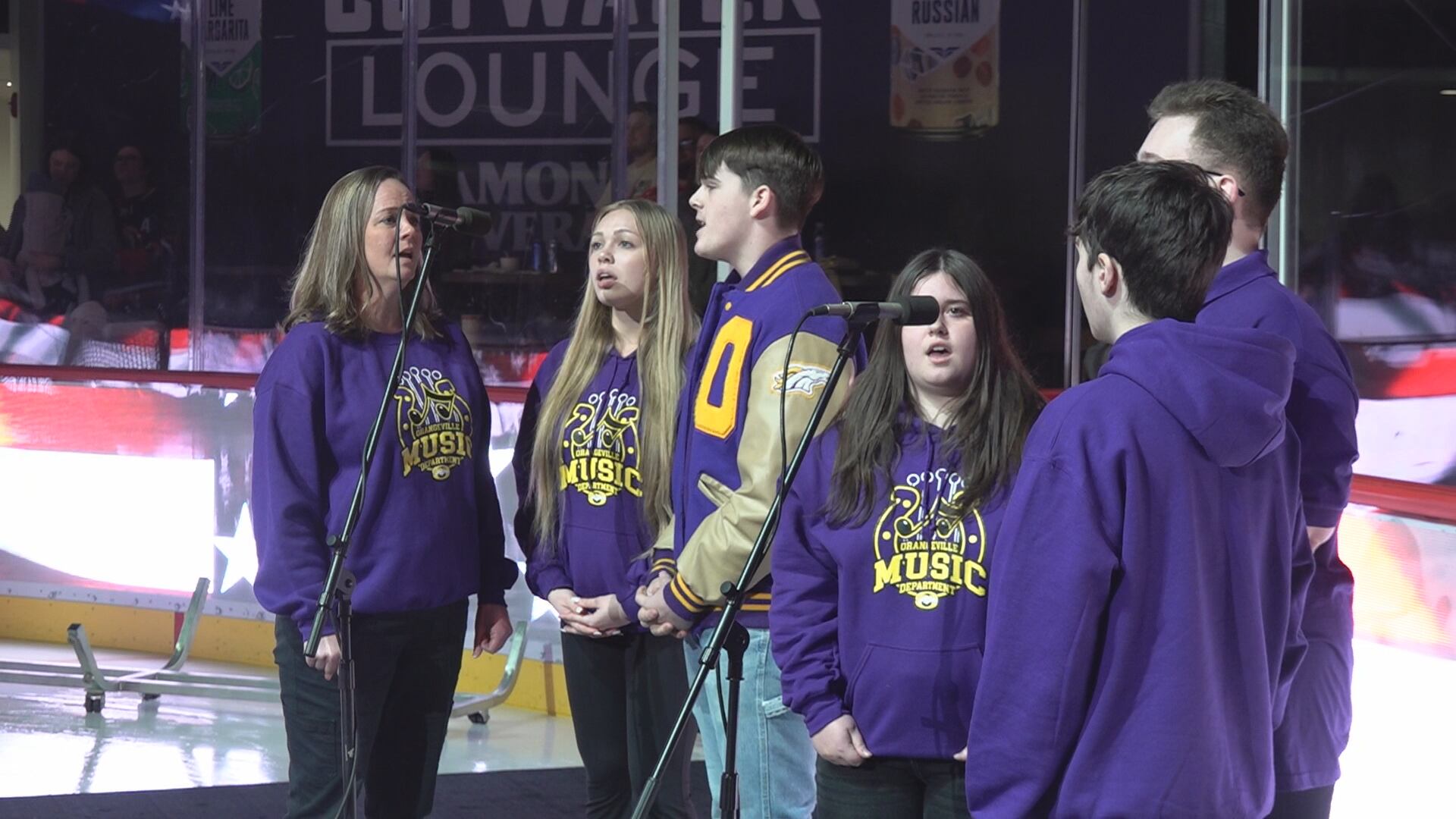 Orangeville students take center ice to sing national anthem at IceHogs ...