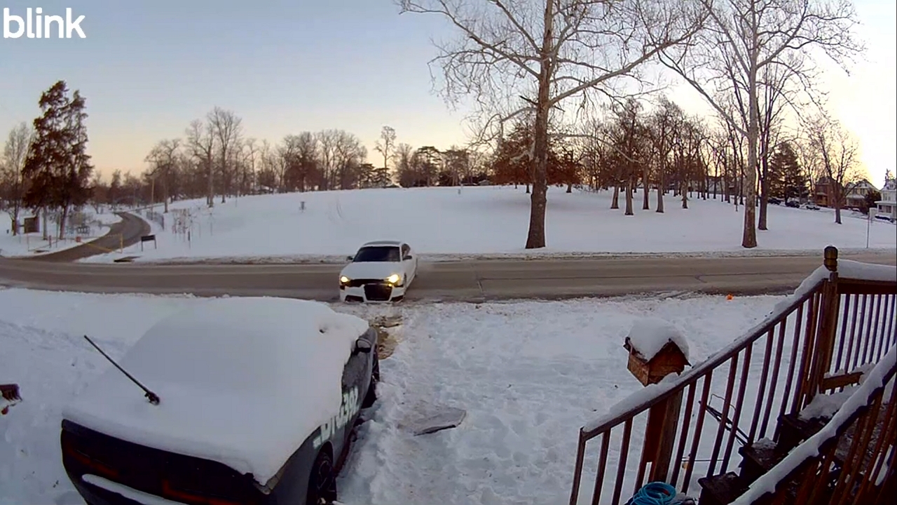 Car bumper ripped off while backing out in deep snow in Keokuk, USA