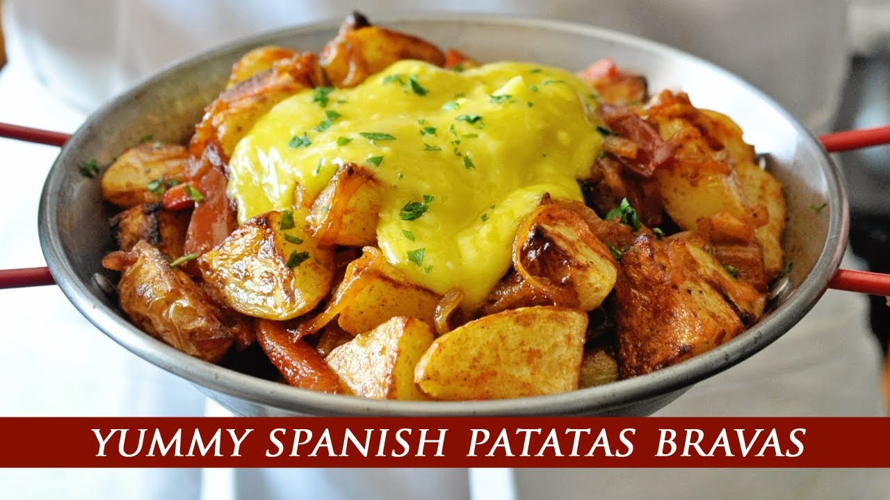 Country-style patatas bravas with peppers, onions & aioli