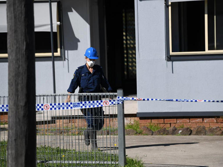 Carer charged years after fatal house fire