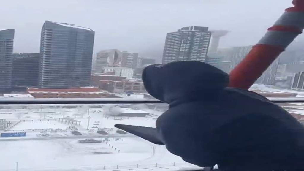 Calgary woman charged after traffic cone tossed off downtown apartment ...