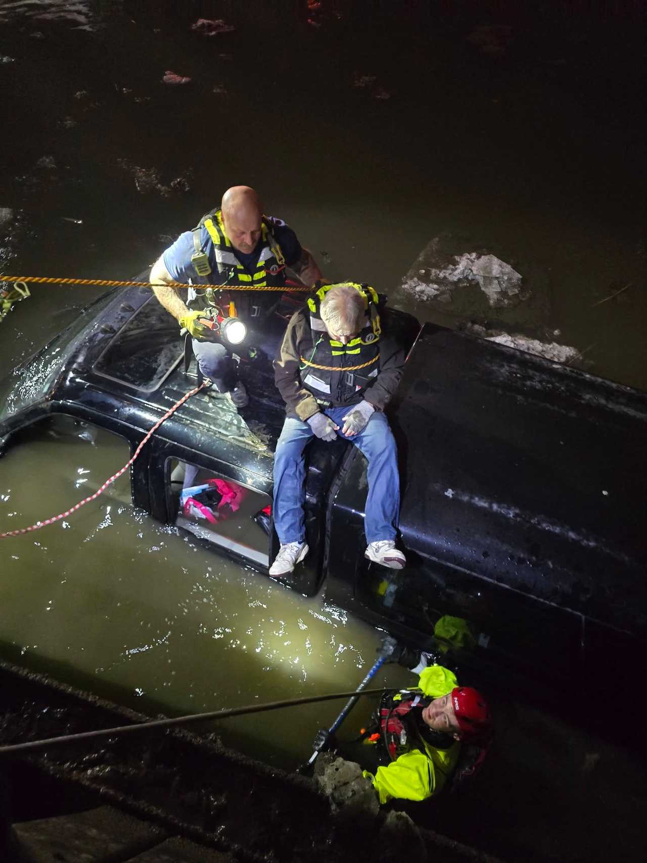 Truck plunges into icy Hackensack River, firefighters pull man to ...