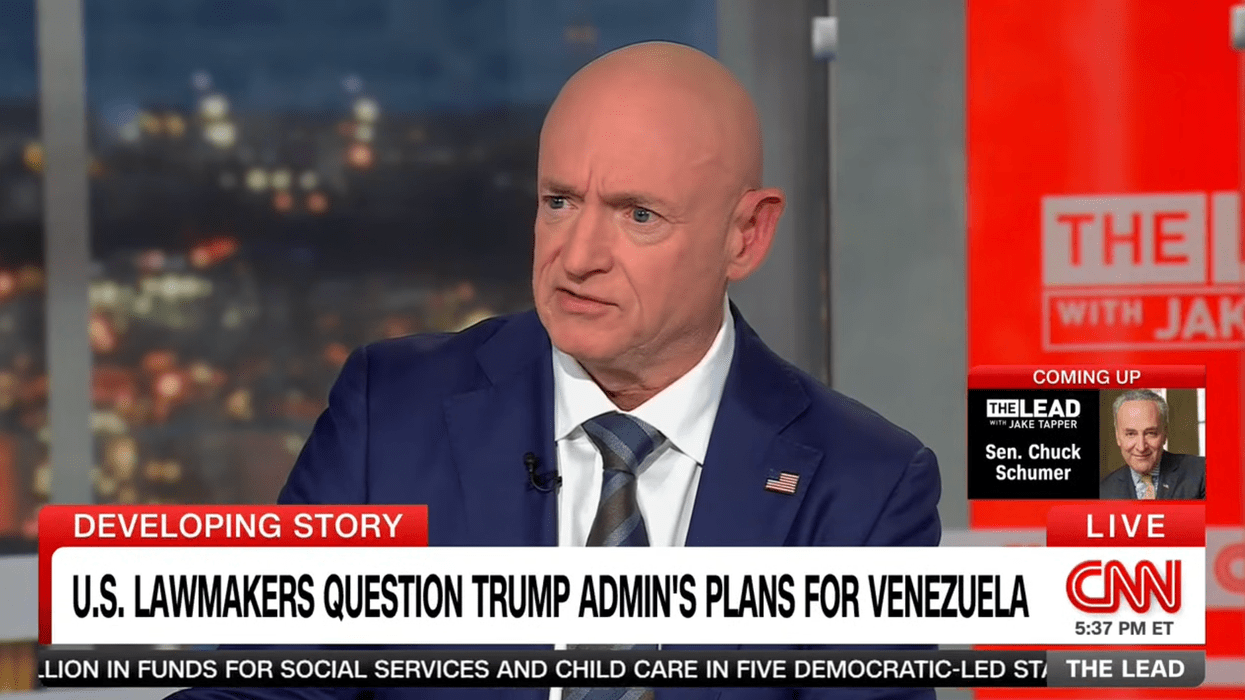 Mark Kelly criticizes Stephen Miller for 'no plan' on Venezuela