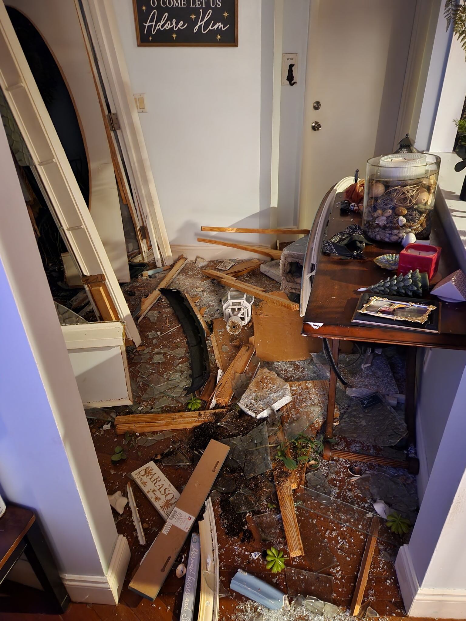 Family returns from dinner to find a car had crashed into their house