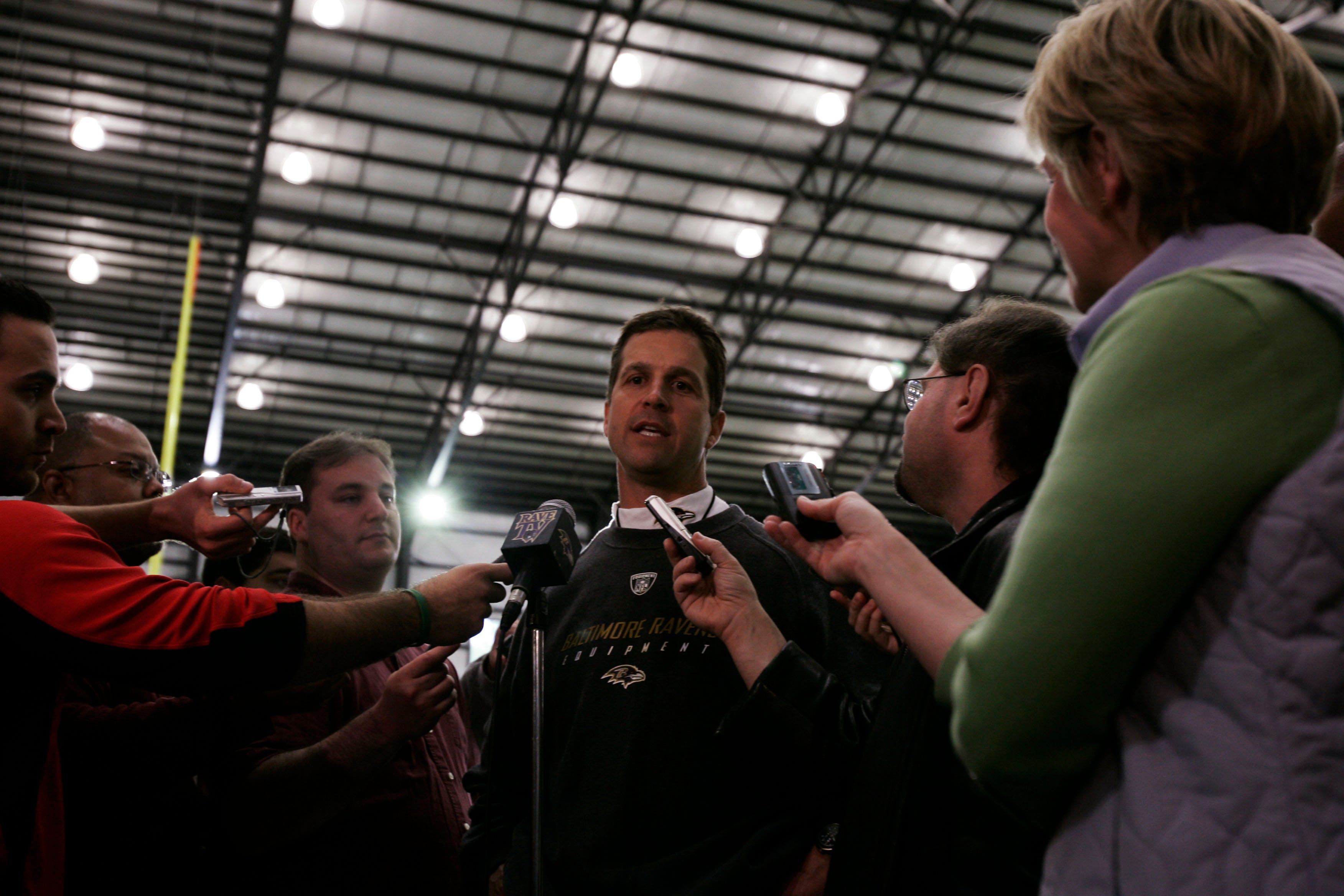 Who was coaching NFL teams in 2008 when Ravens hired John Harbaugh?